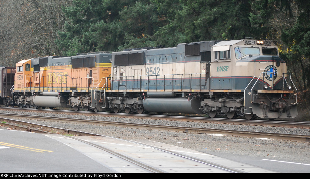 BNSF 9879 & BNSF 9542 are DPUs on rear of coal train
